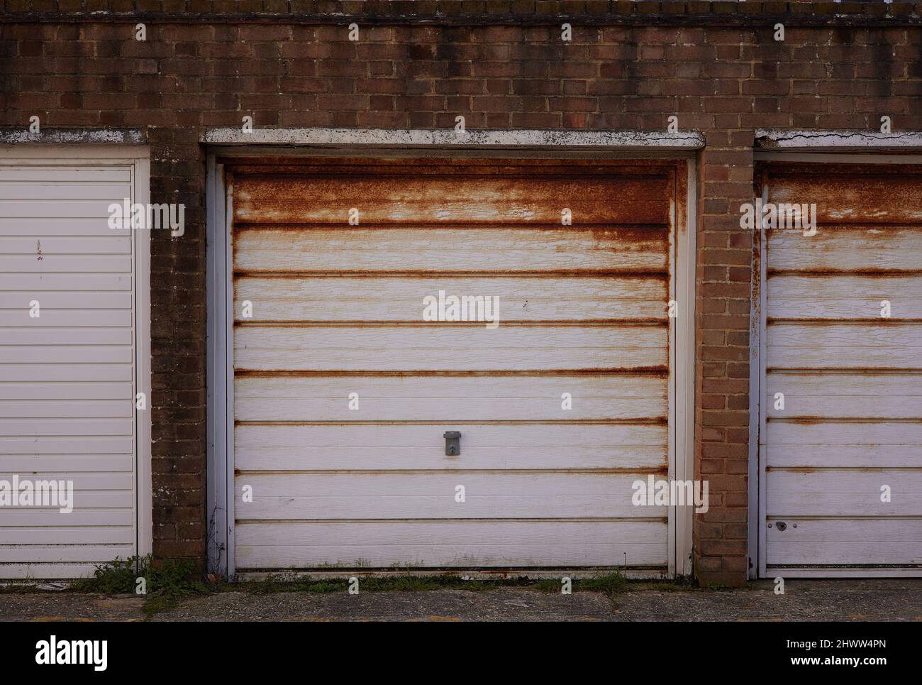 Rusted garage door seen in England UK Stock Photo - Alamy