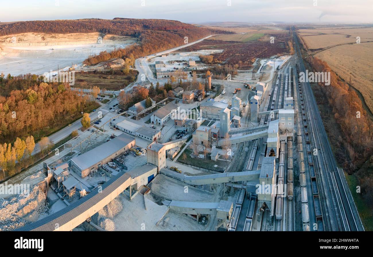 Aerial view of cargo train loaded with crushed stone materials at ...
