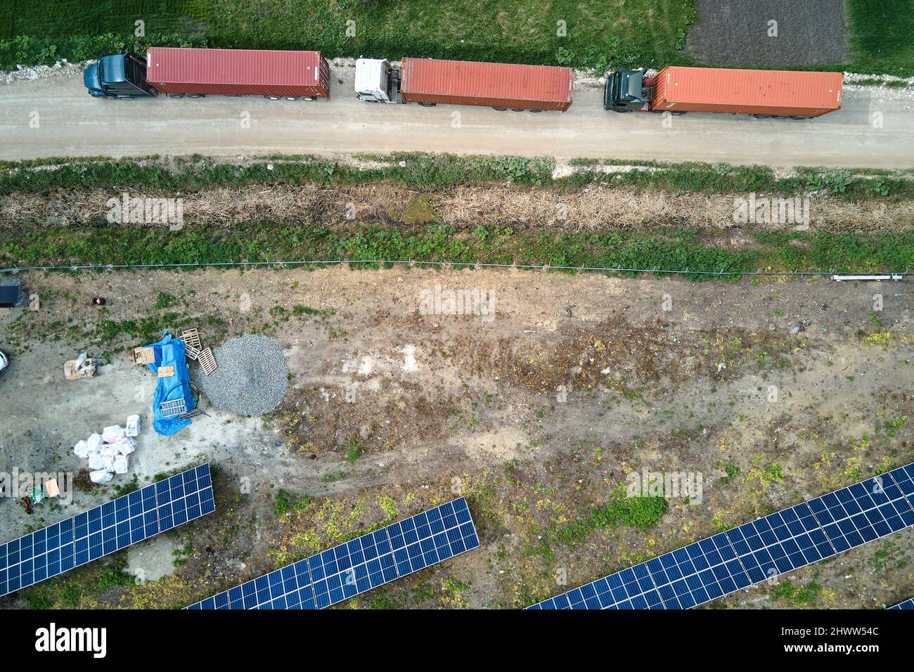 Aerial view of electrical power plant under construction with truck ...