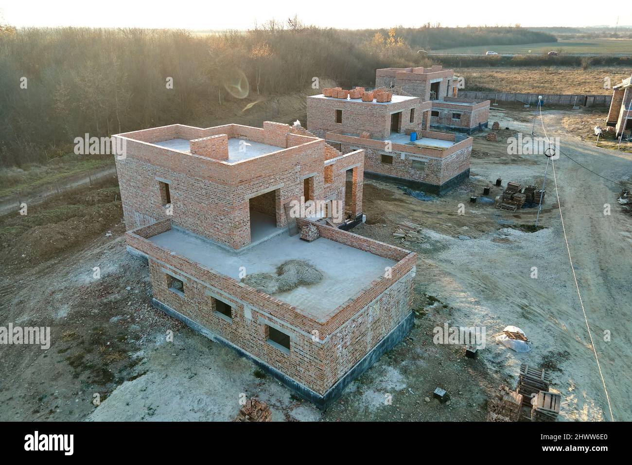 Industrial building site in rural area with residential houses under ...