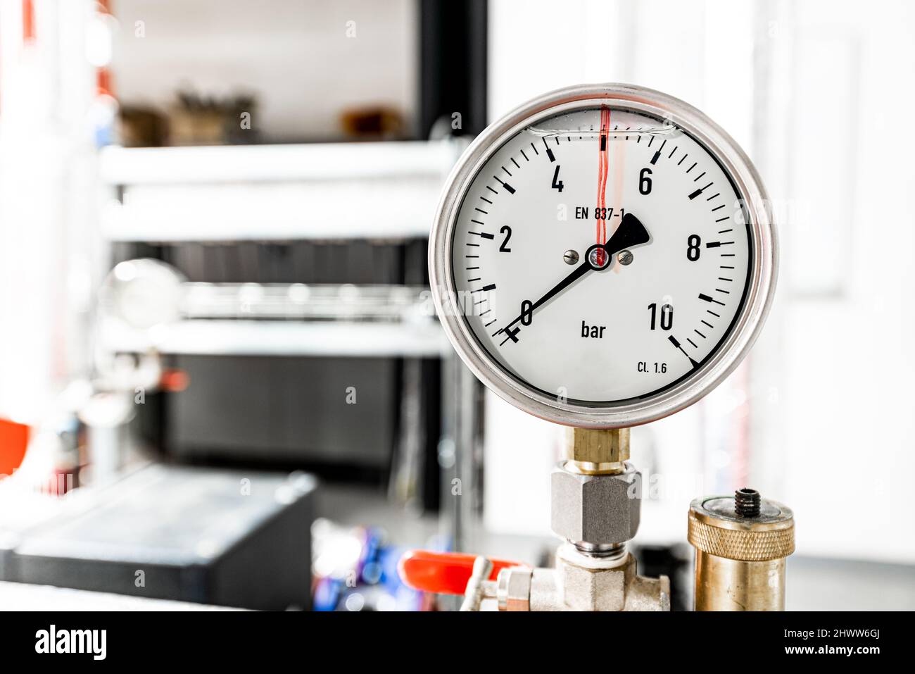 Barometers on pressure pipes, underground premises of the factory Stock ...