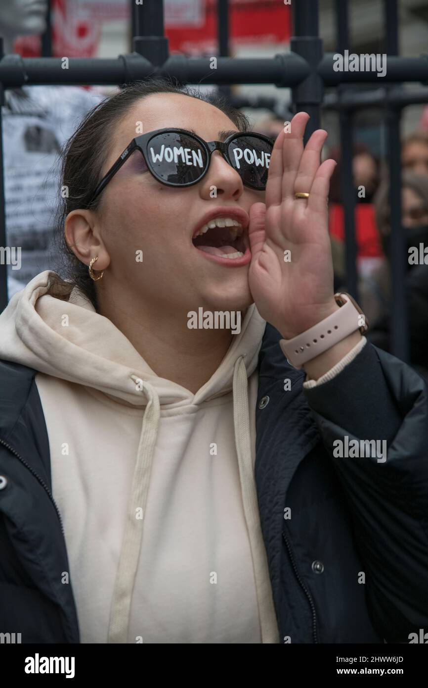 A large crowd marches during the International Women's Day protest in ...
