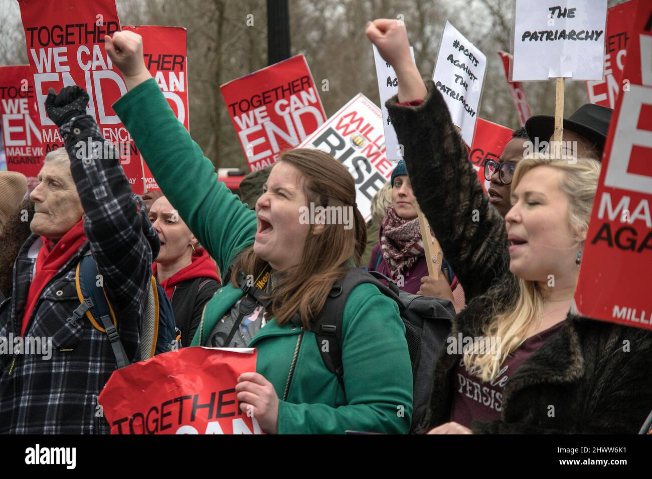 A large crowd marches during the International Women's Day protest in ...