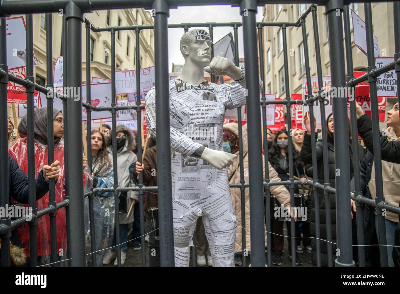 A large crowd marches during the International Women's Day protest in ...