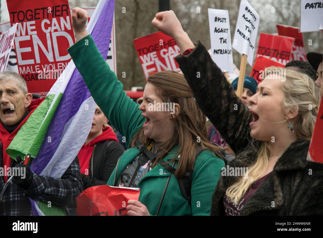 A large crowd marches during the International Women's Day protest in ...