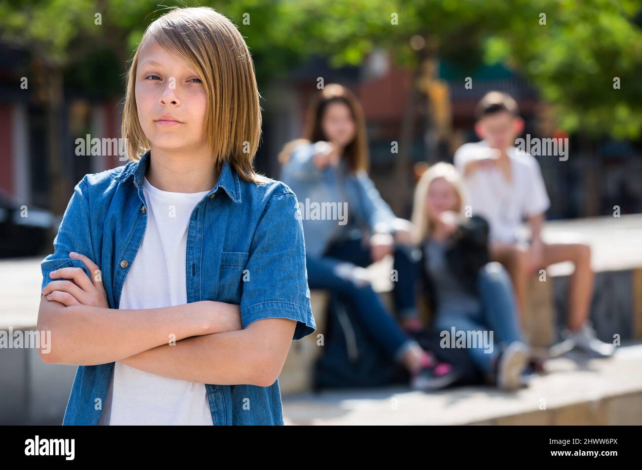 Outcasted teenage boy outdoors Stock Photo - Alamy