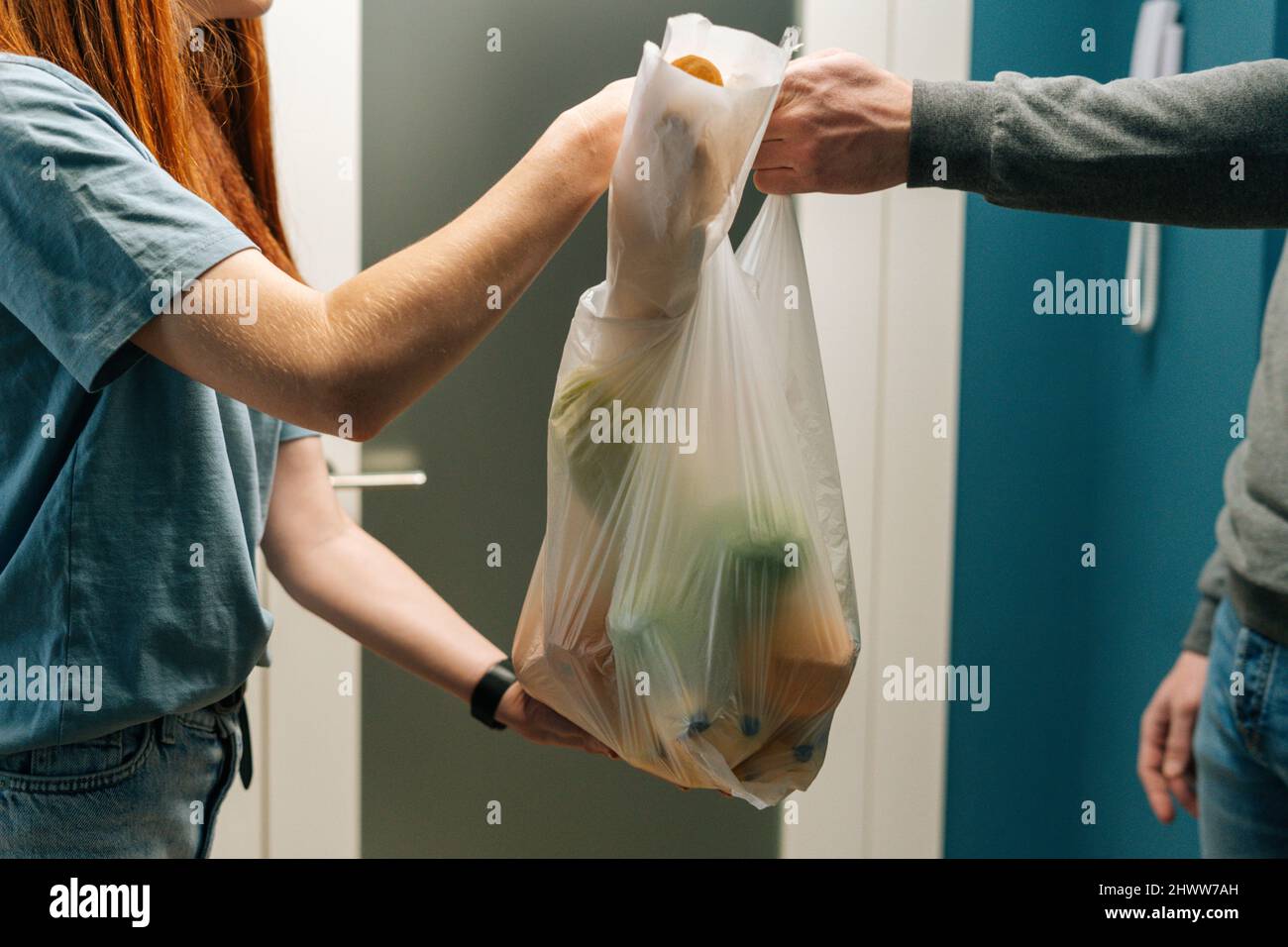Close-up cropped shot of unrecognizable young female customer receiving ...