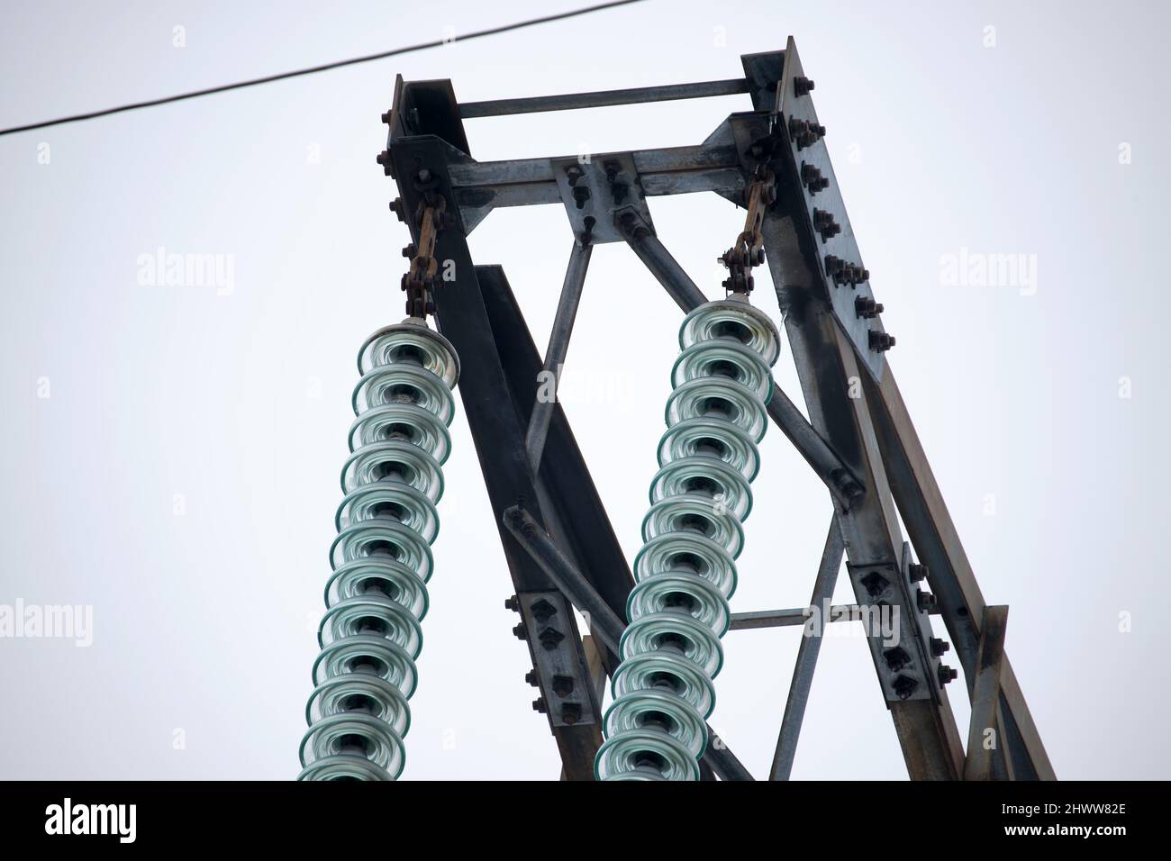 High voltage power line with insulation divider of electric power wires ...