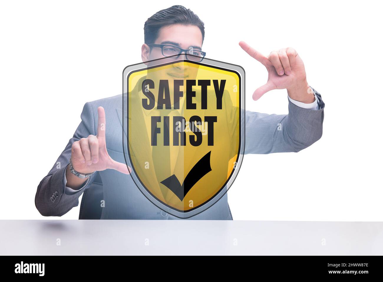 Safety first concept with the businessman Stock Photo - Alamy