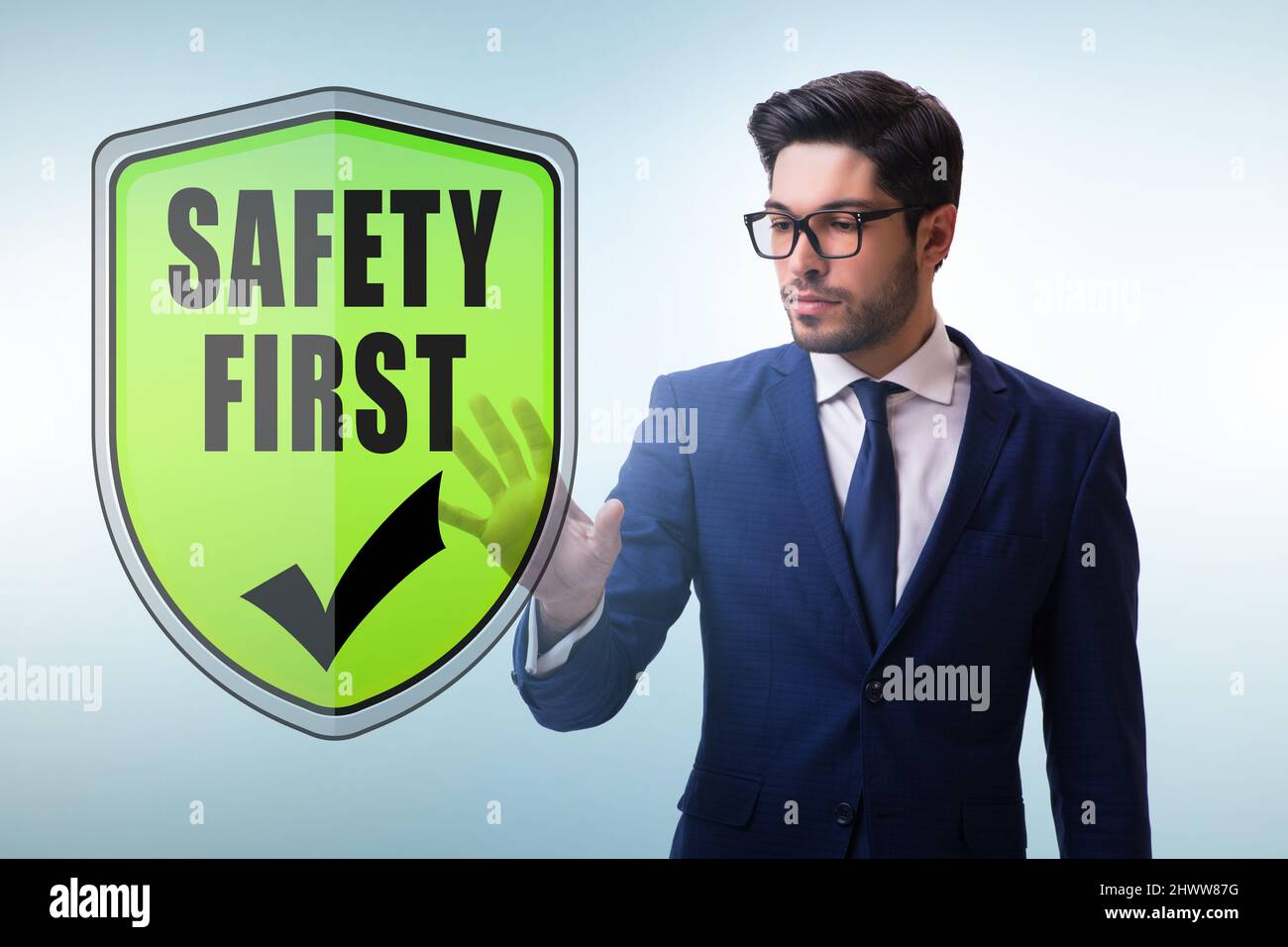 Safety first concept with the businessman Stock Photo - Alamy