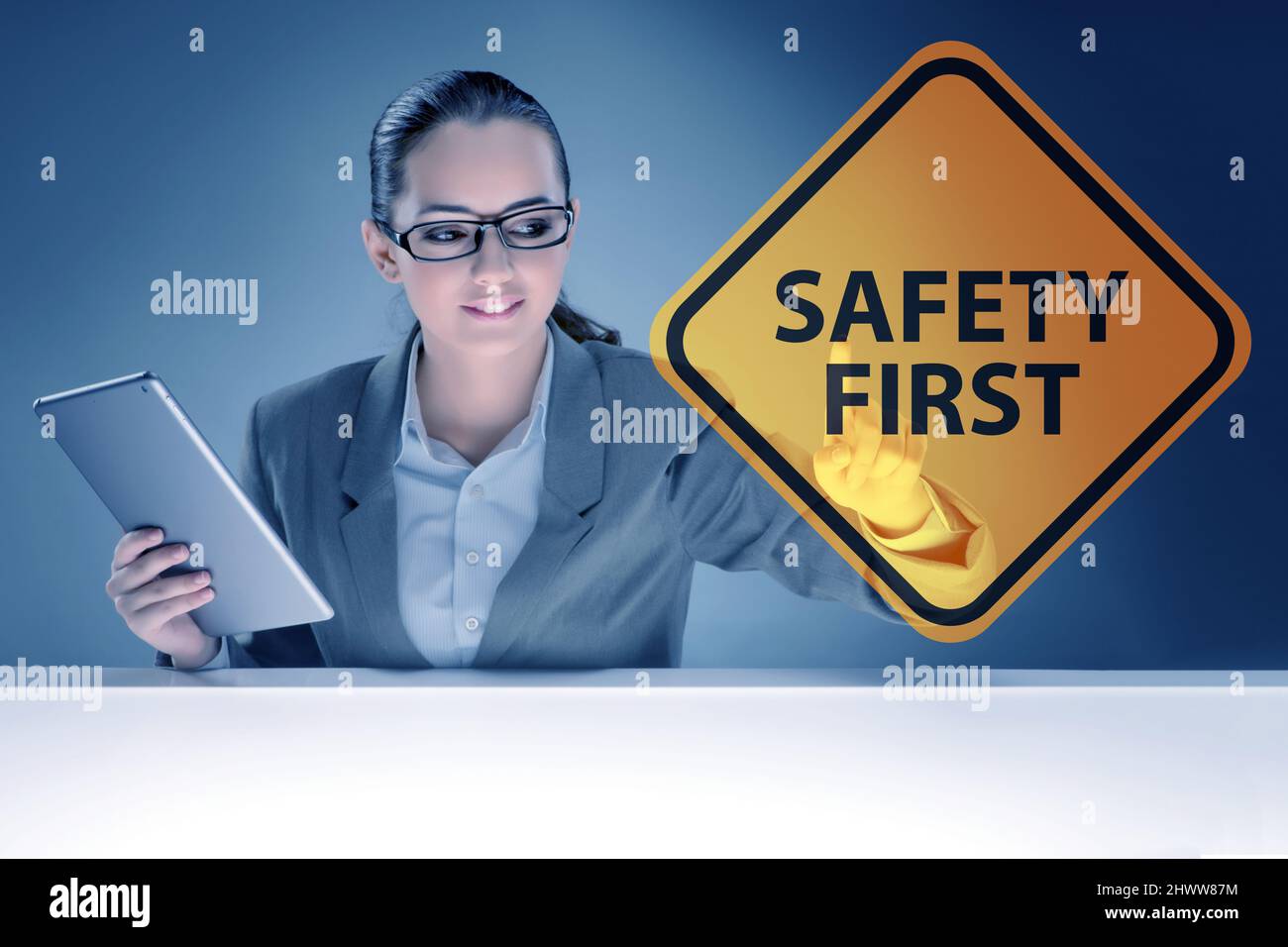 Safety first concept with the businesswoman Stock Photo - Alamy