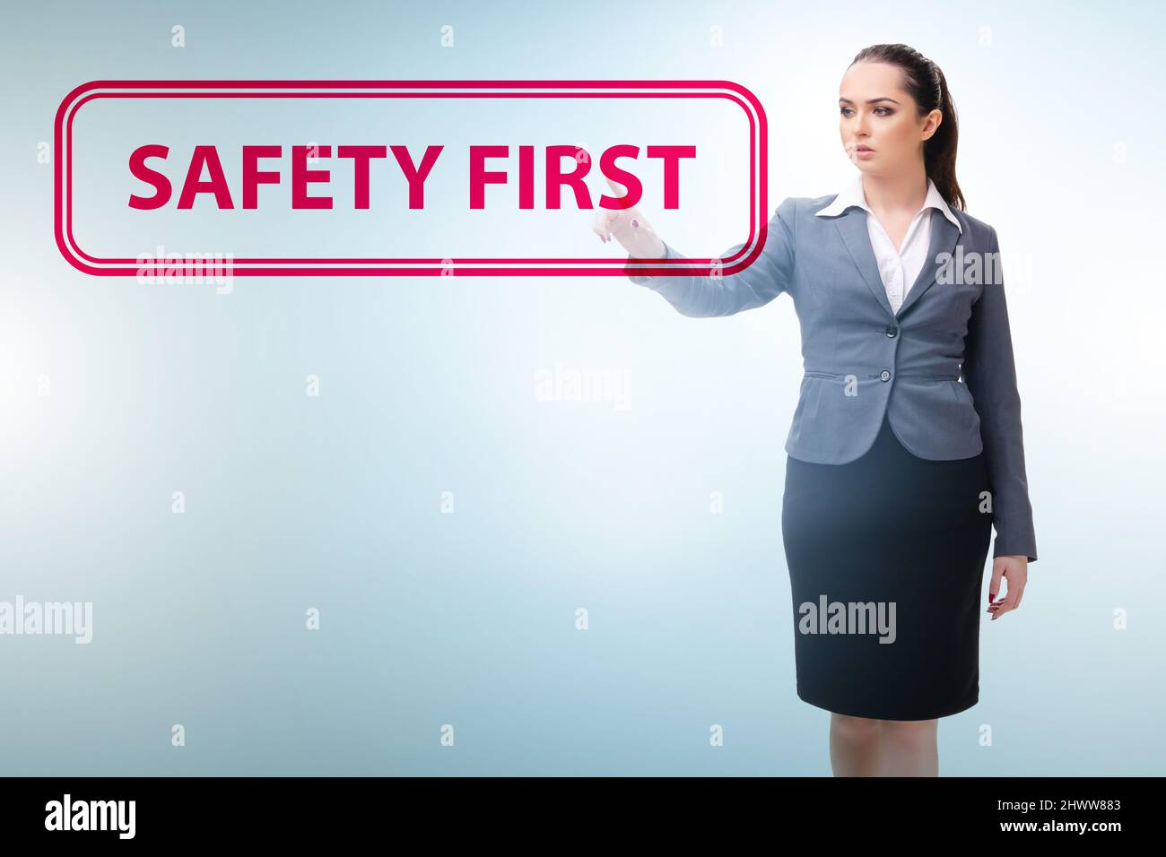 Safety first concept with the businesswoman Stock Photo - Alamy