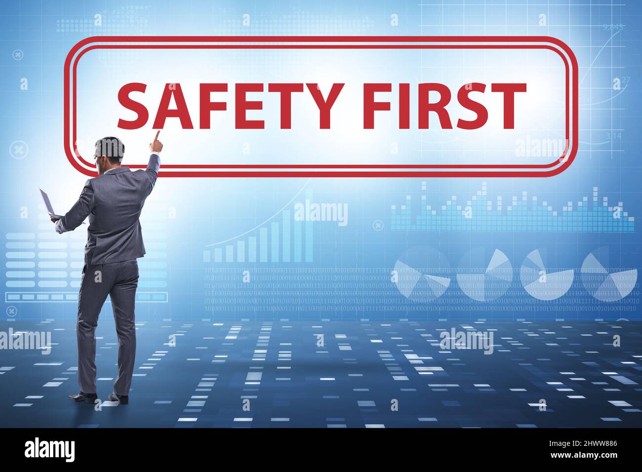 Safety first concept with the businessman Stock Photo - Alamy