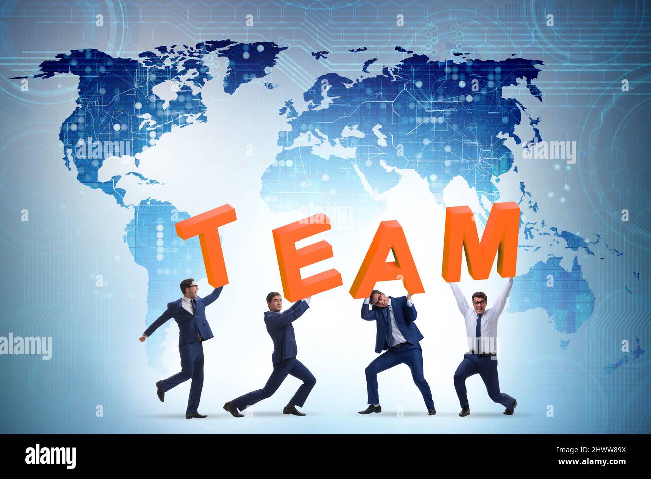 Teamwork concept with the people carrying team letters Stock Photo - Alamy