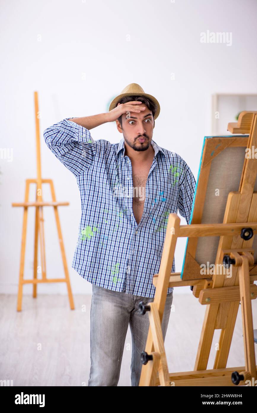 Portrait young upset man paint hi-res stock photography and images - Alamy