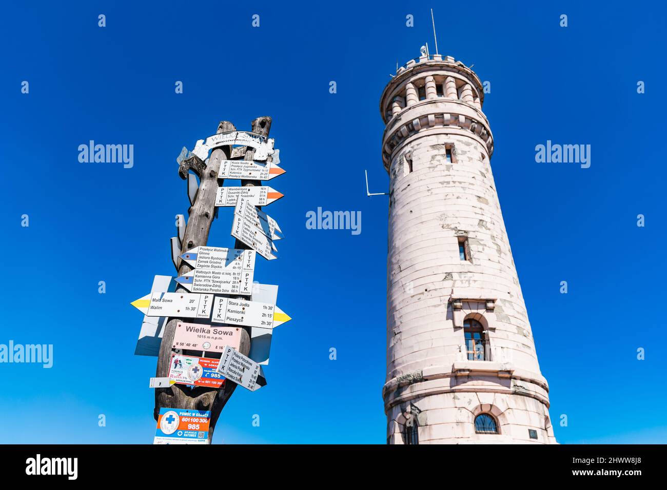 Owl Mountains, Poland - April 2021: Small square with old viewing tower ...