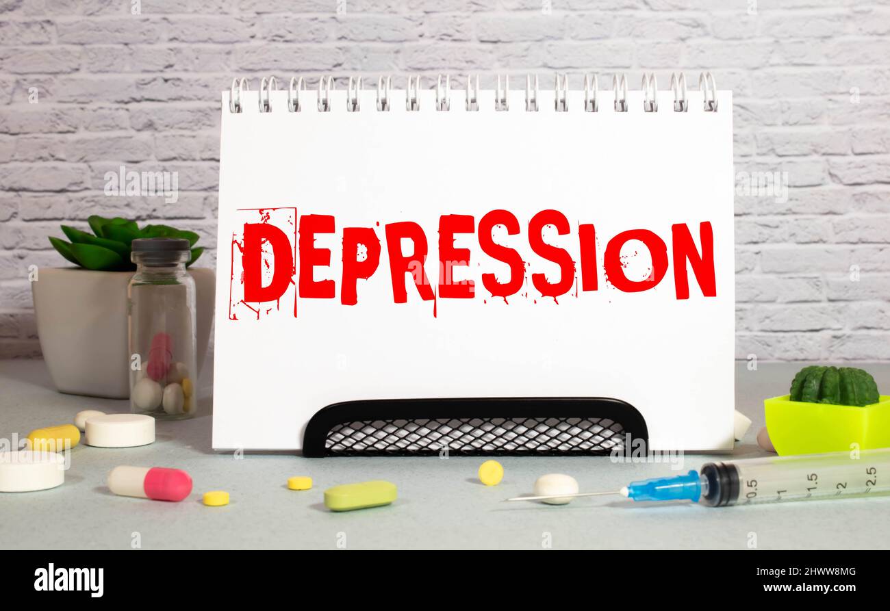 Depression word on lightbox on modern yellow office desktop Stock Photo ...