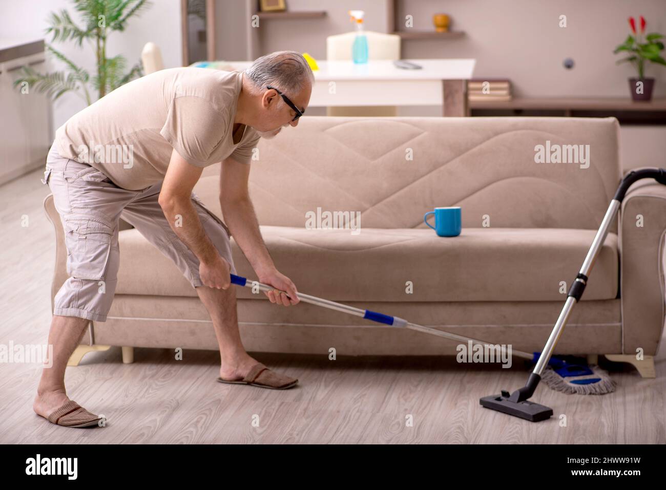 Man doing housework washing floor hi-res stock photography and images ...