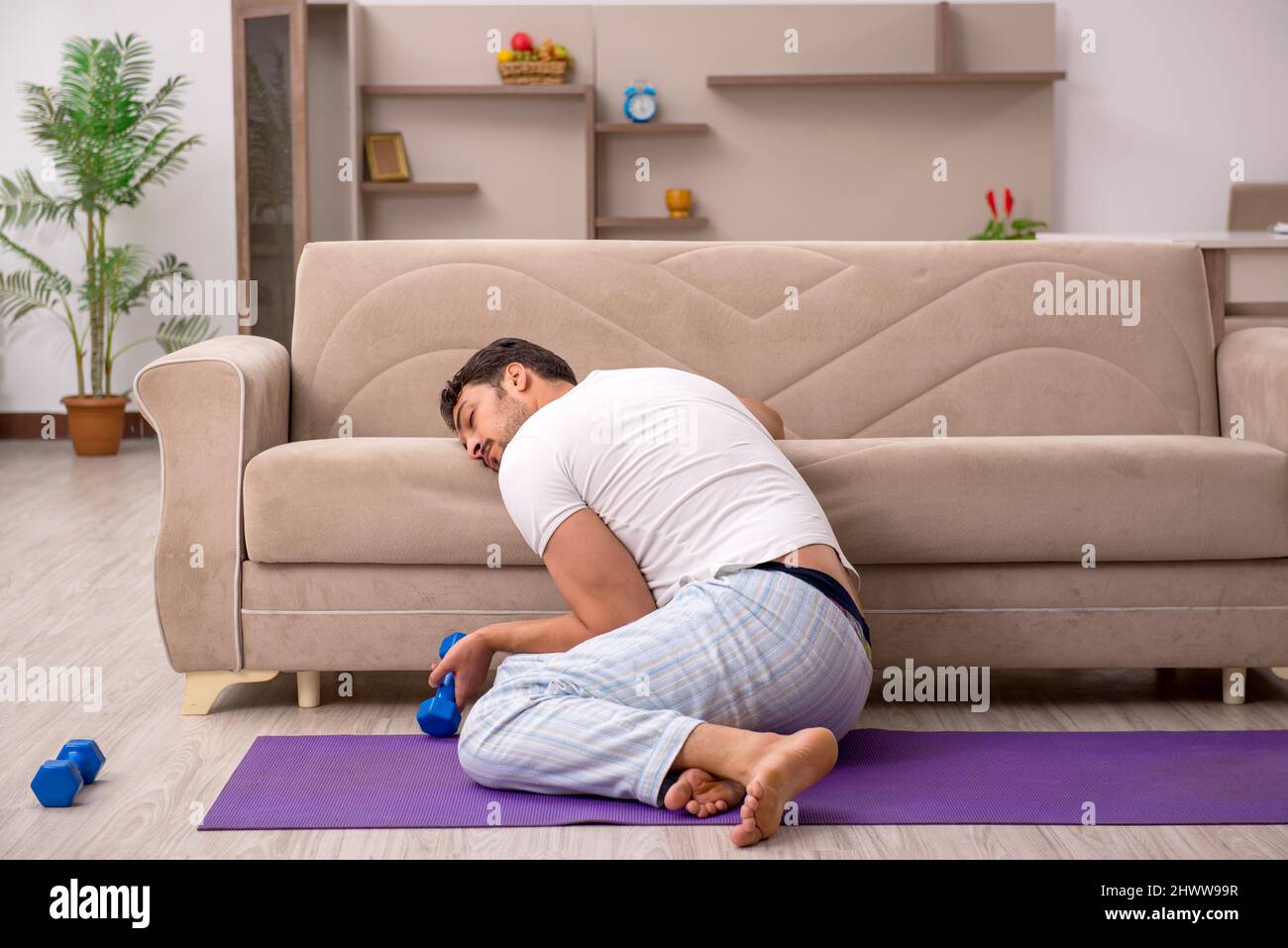 Napping man gym hi-res stock photography and images - Alamy