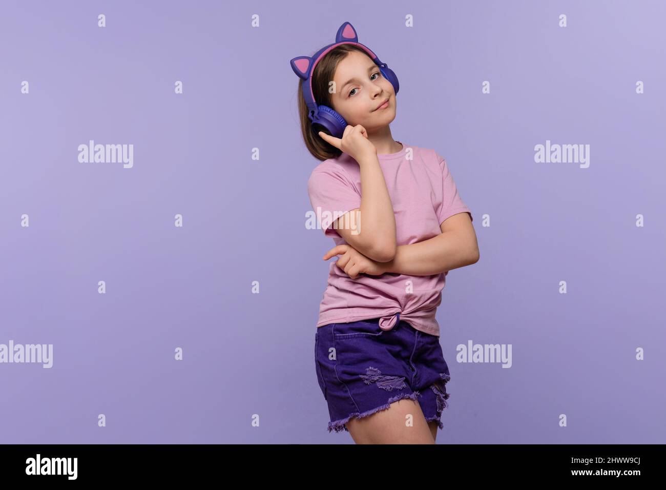 Portrait little nice Girl 9-11 y.o. wearing basic clothes and stylish ...