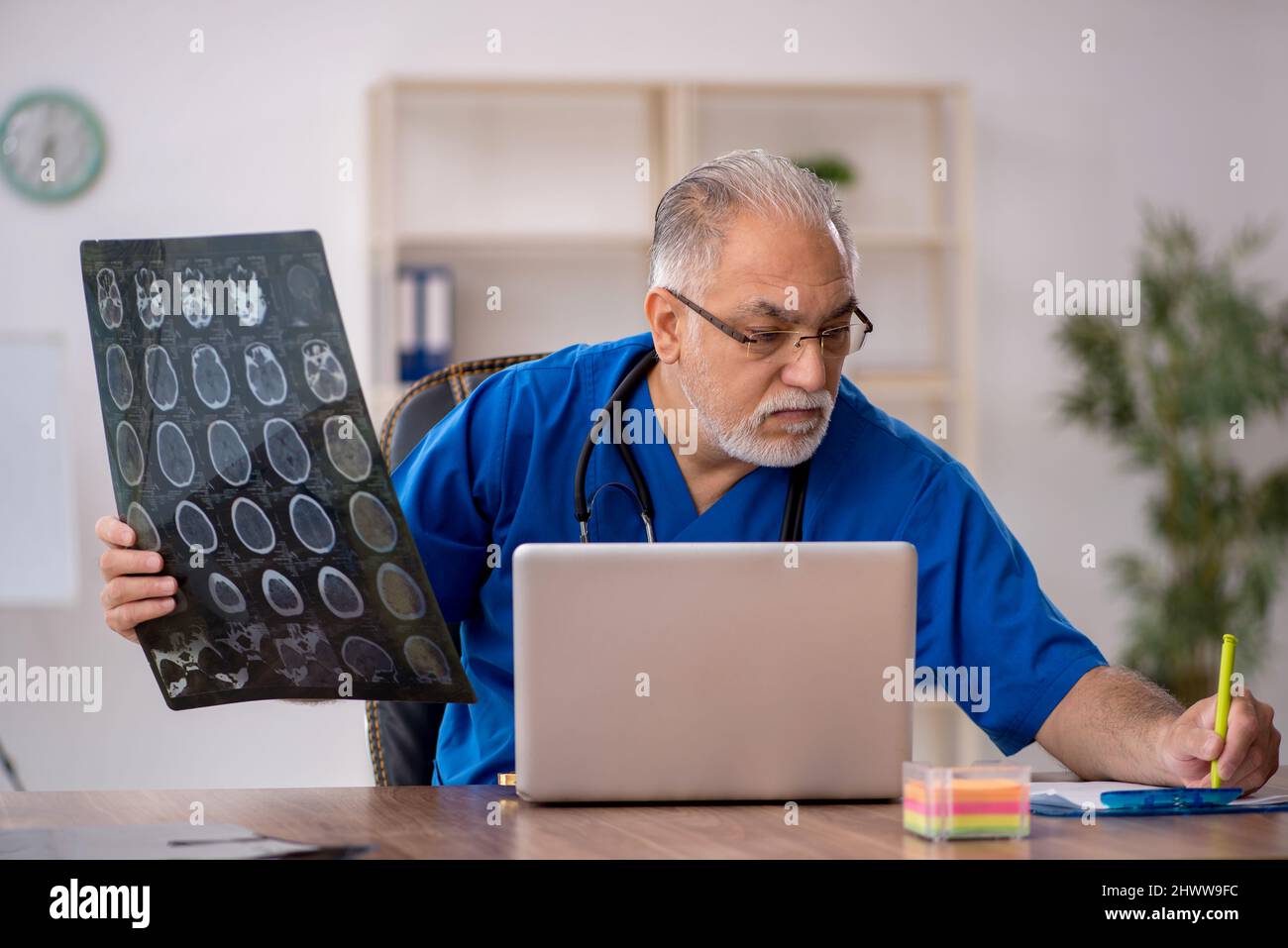 Hospital radiologist checking notes hi-res stock photography and images ...