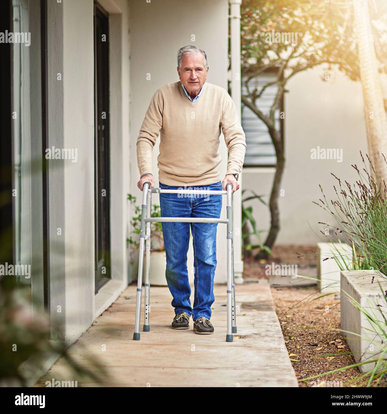 Senior man stepping outside hi-res stock photography and images - Alamy