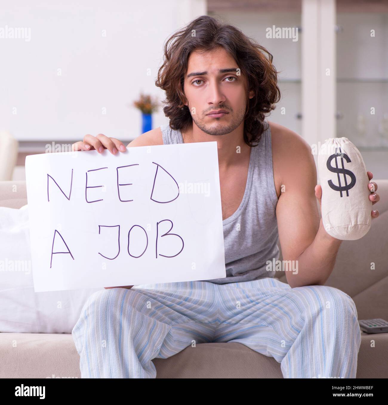 The unemployed man desperate at home Stock Photo - Alamy