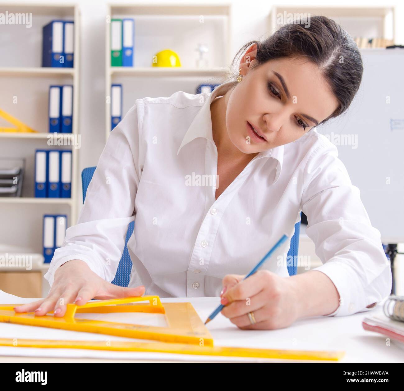 Female architect drafting blueprint ruler hi-res stock photography and ...