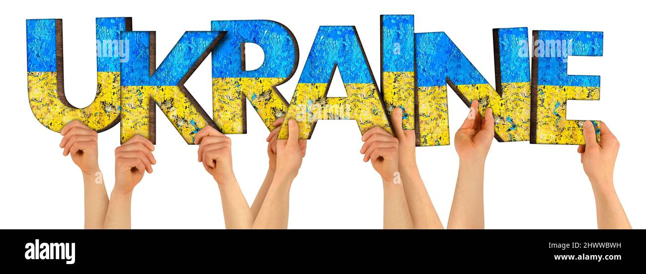 people arms hands holding up wooden letter lettering forming word ...