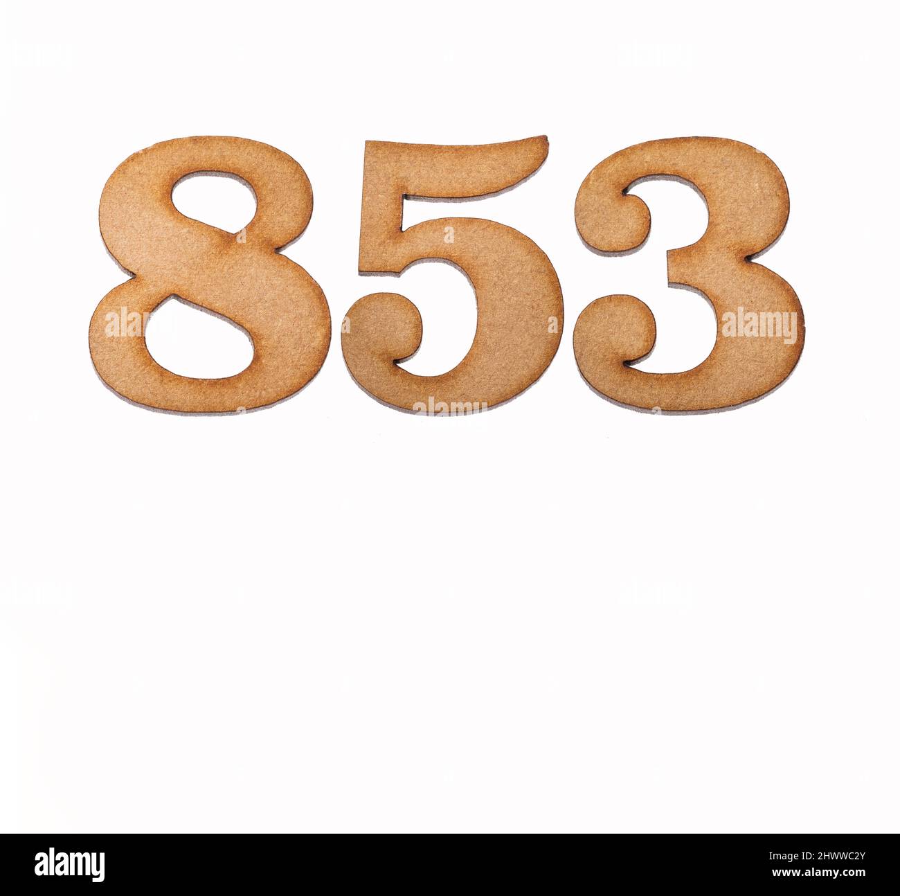 Number 853 in wood, isolated on white background Stock Photo - Alamy