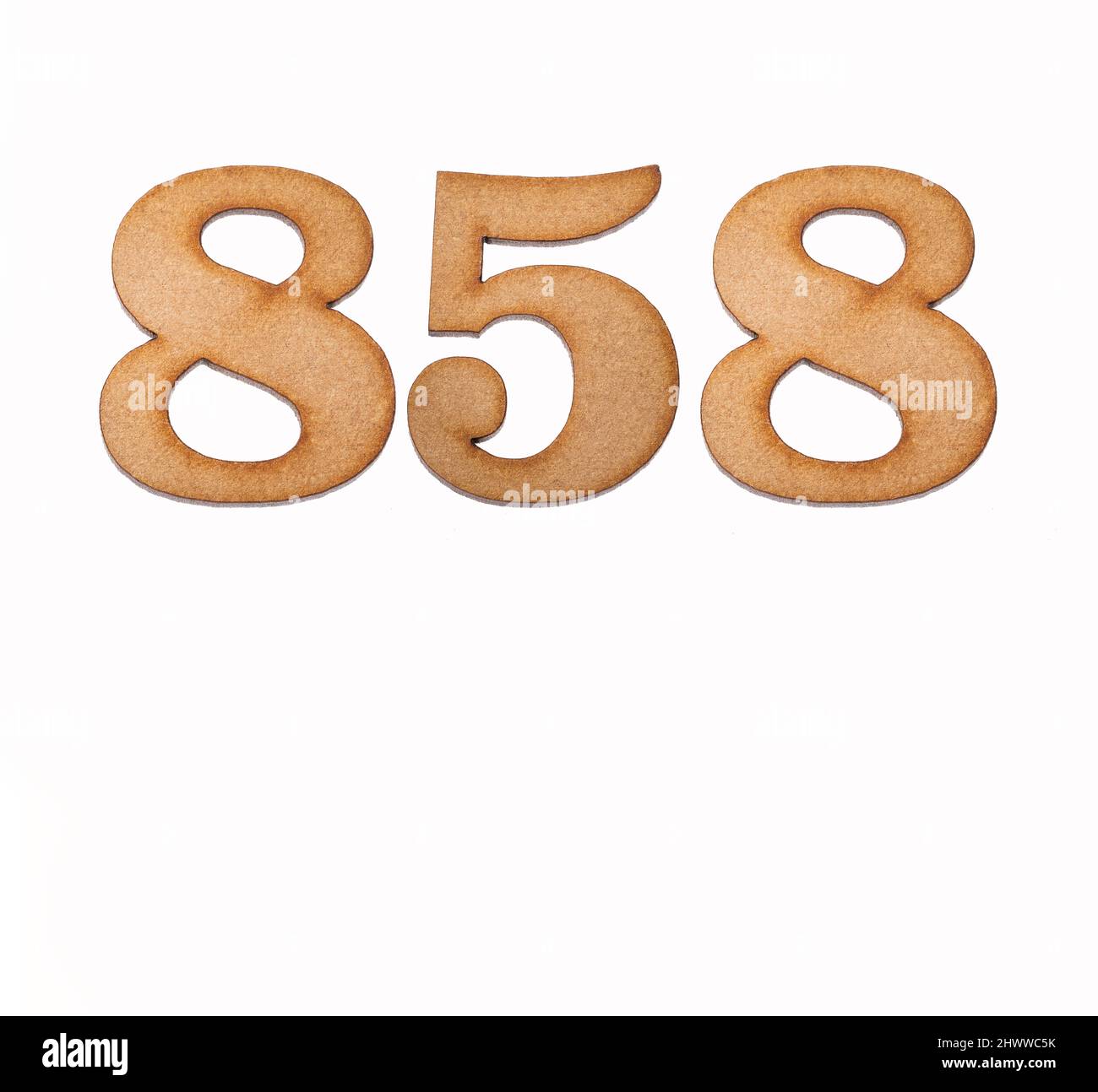 Number 858 - Piece of wood isolated on white background Stock Photo - Alamy