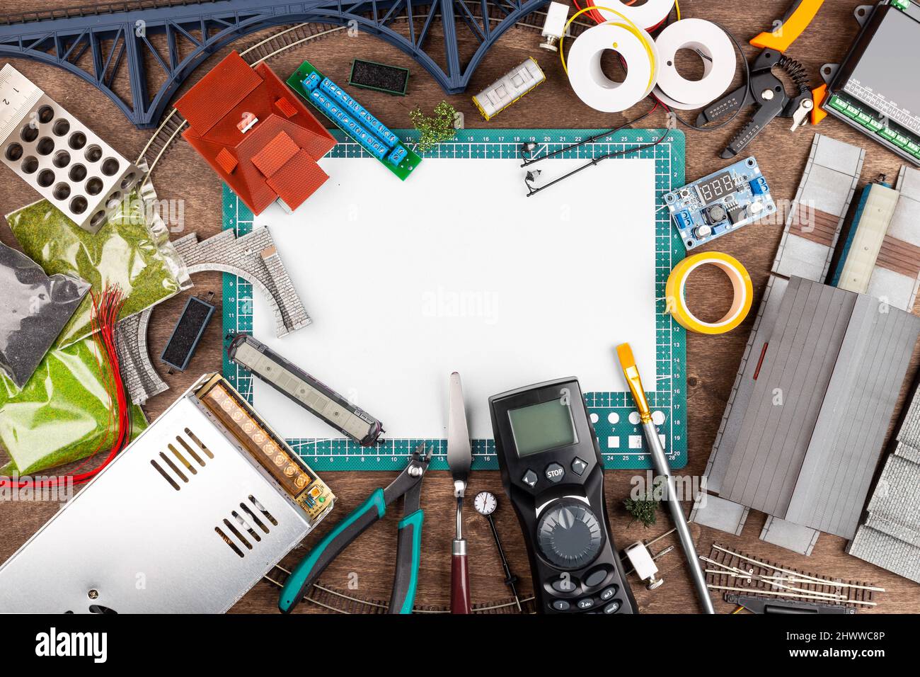 construction of a model railroad layout. workbench with model railway ...