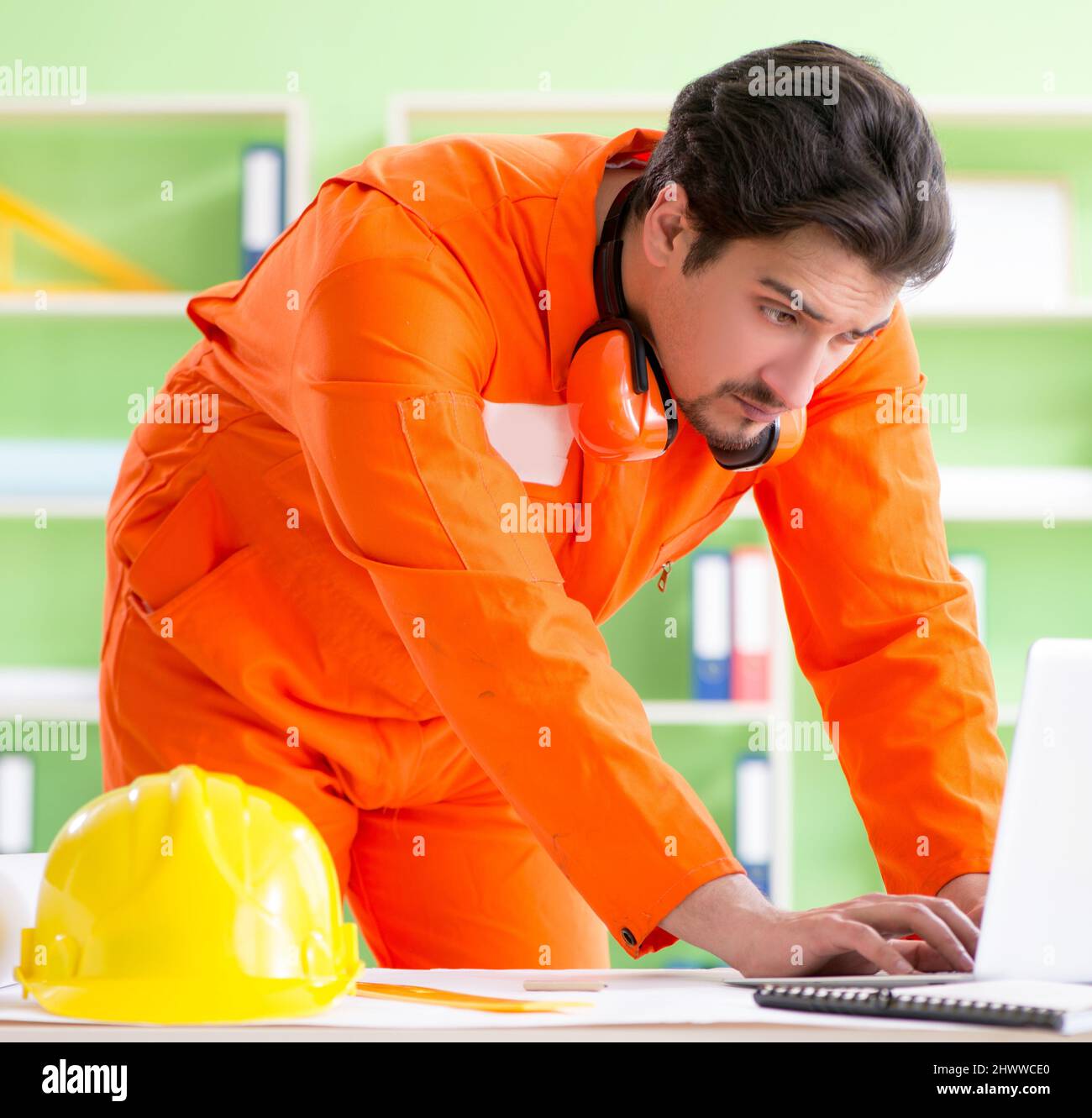 The construction supervisor planning new project in office Stock Photo ...