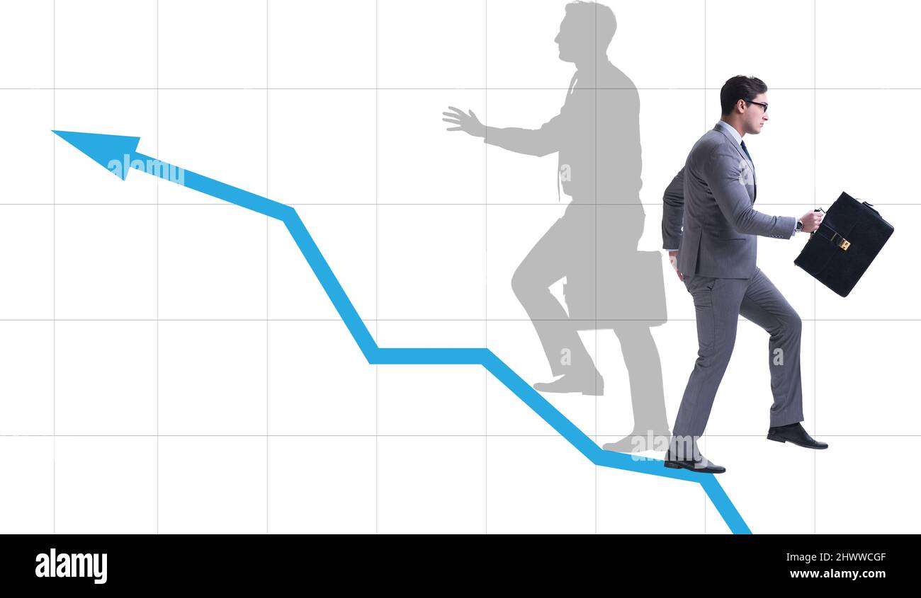 The businessman and his shadow in business concept Stock Photo - Alamy