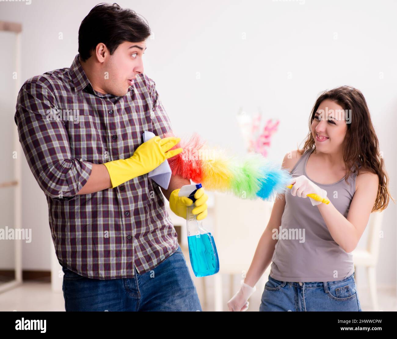 The wife and husband doing cleaning at home Stock Photo - Alamy