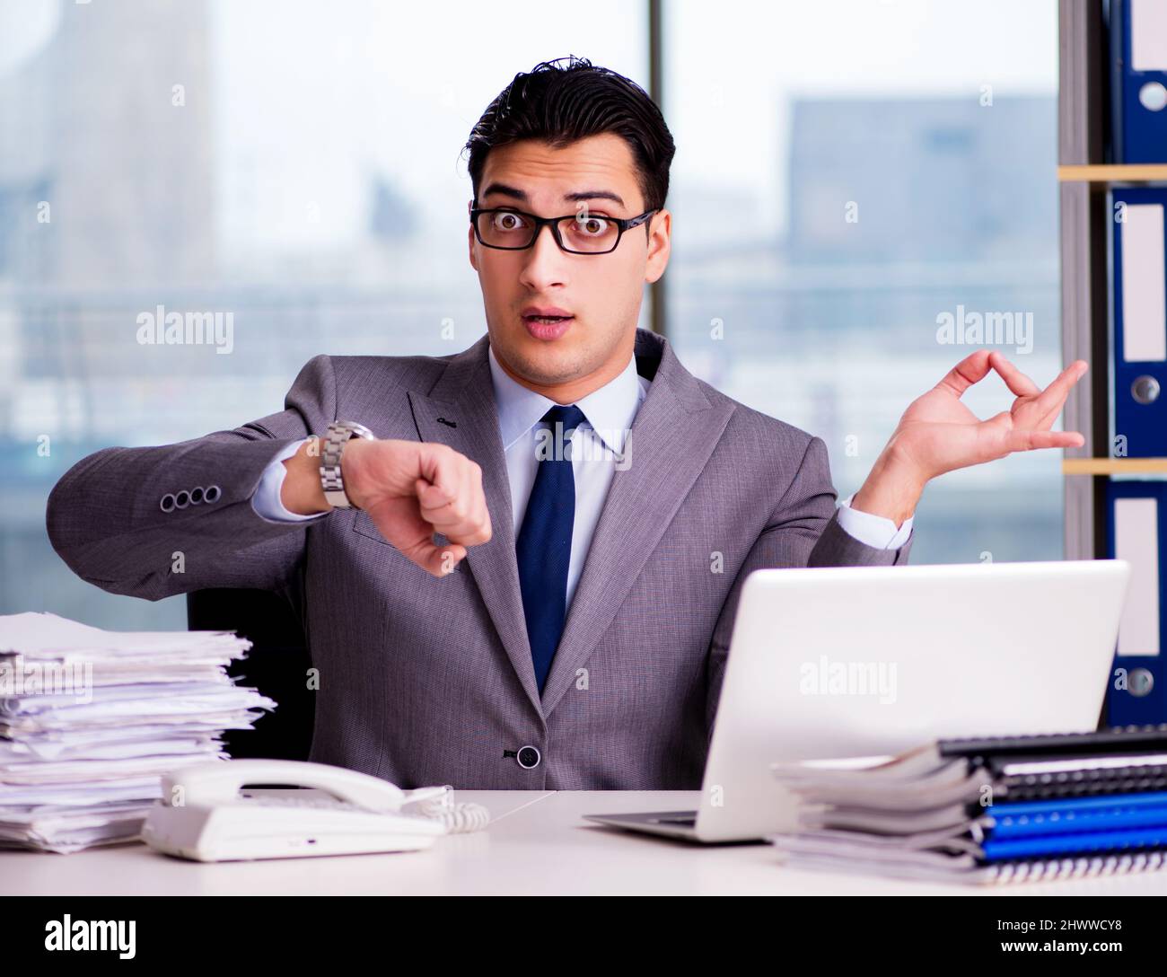 The man being late for his deadlines Stock Photo - Alamy