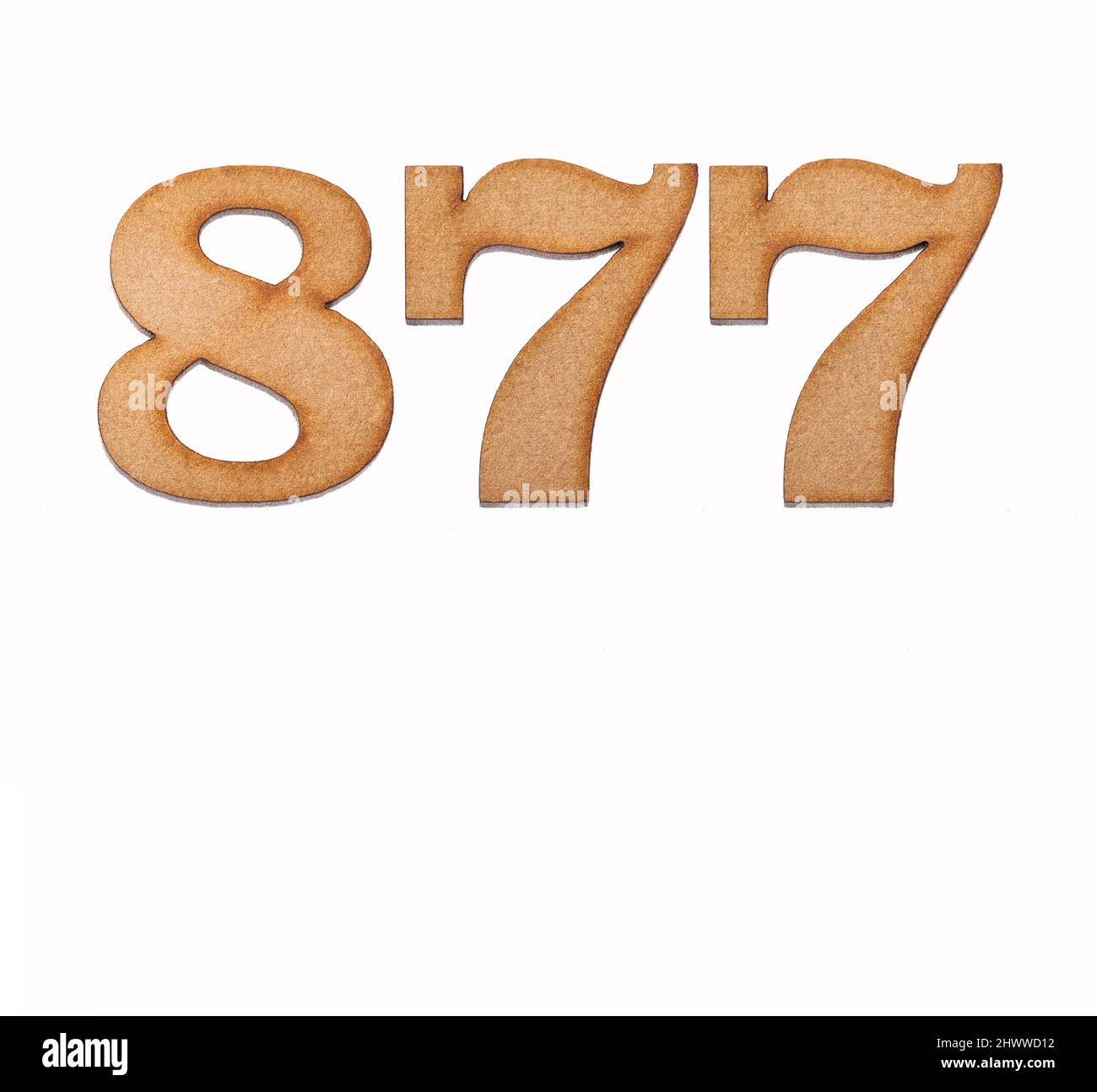 Number 877 in wood, isolated on white background Stock Photo - Alamy