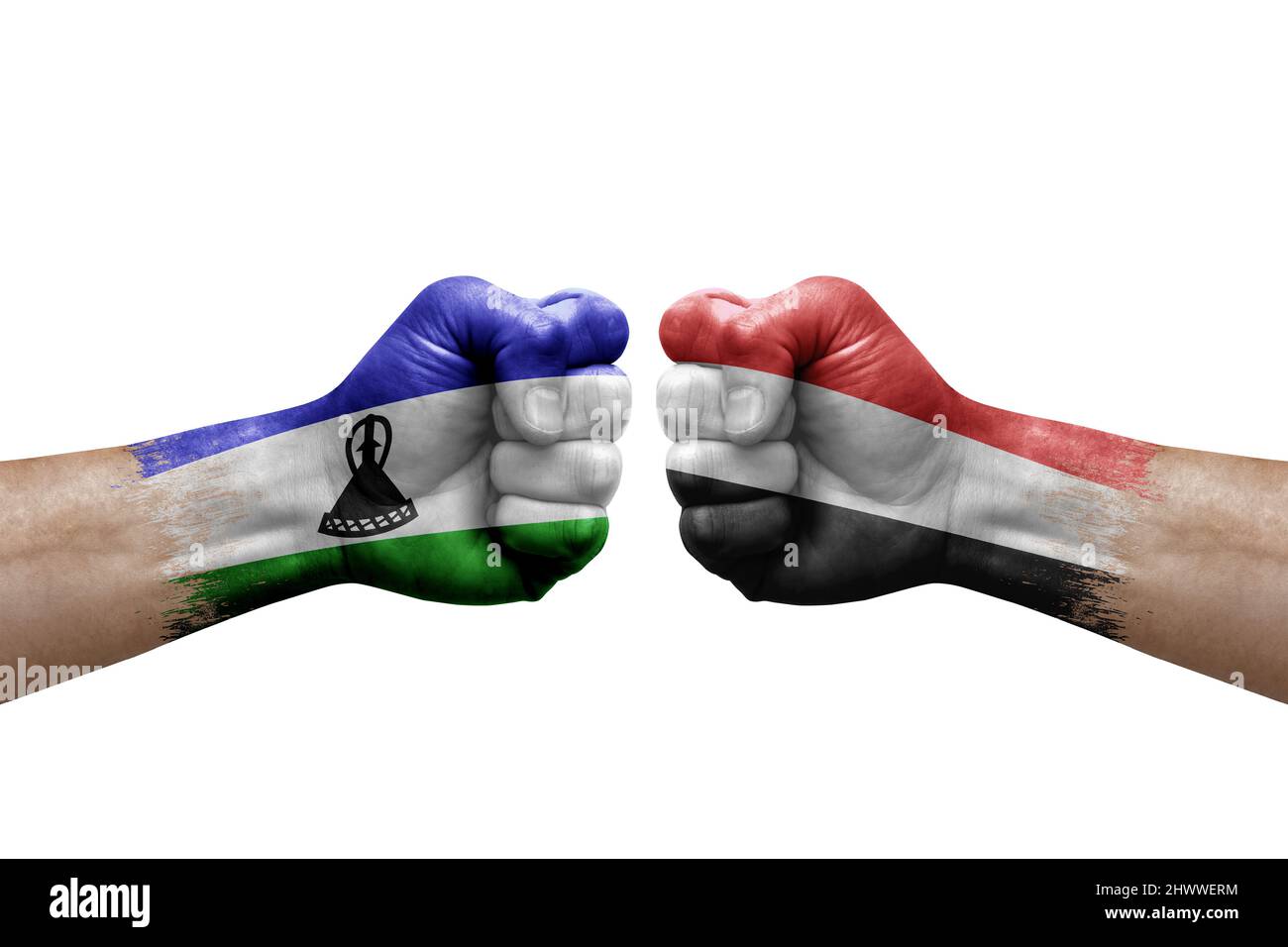 Two hands punch to each others on white background. Country flags ...