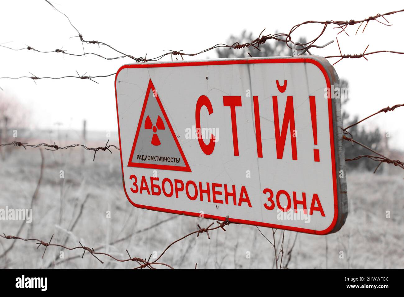 Sign indicating the danger of radioactivity in the city of Pripyat ...