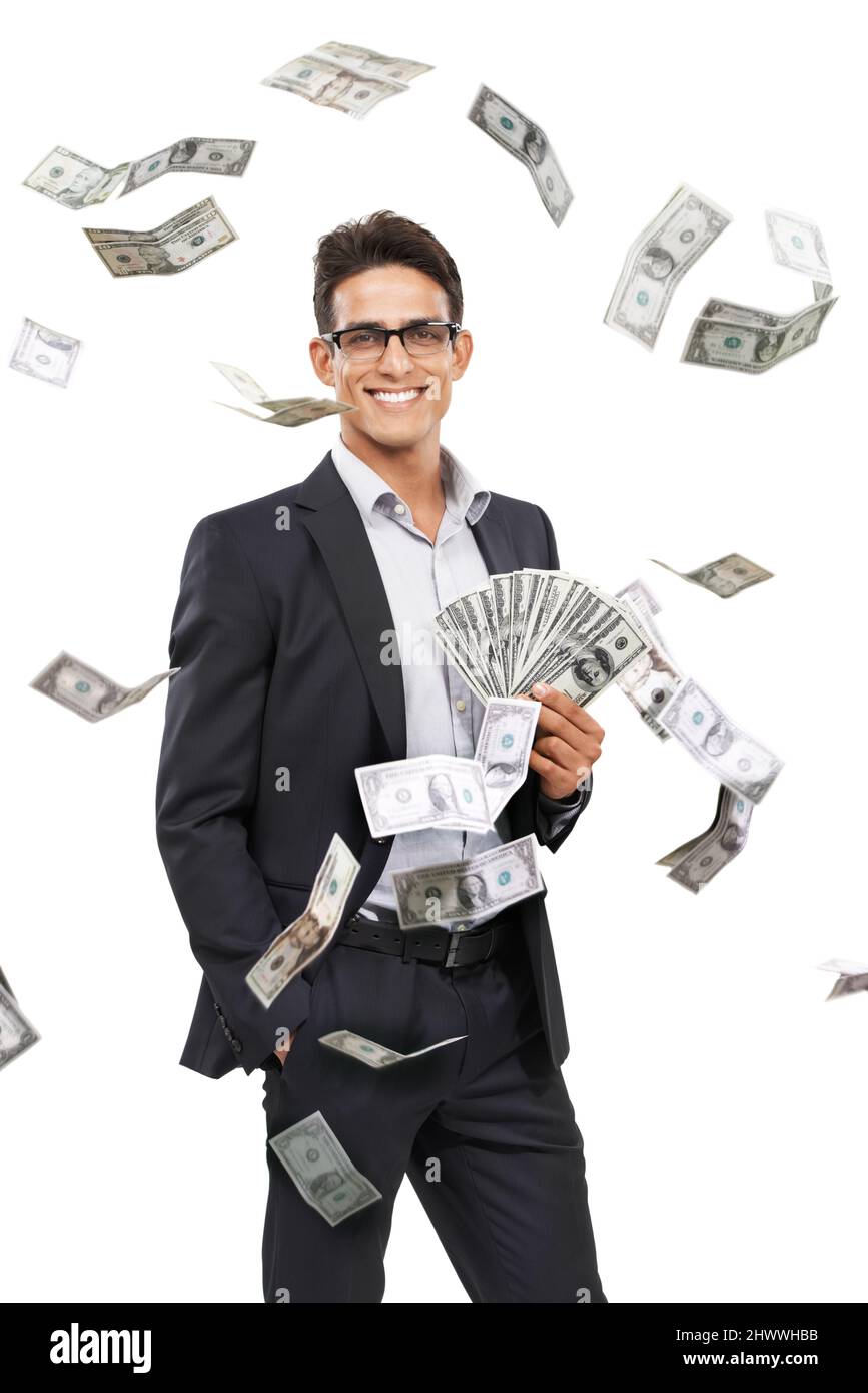 The measure of success. Portrait of a young businessman holding cash as ...