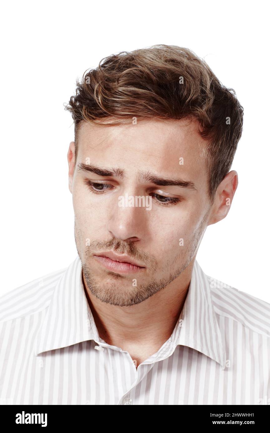 Why so glum, chum. Cropped studio shot of a broody young man isolated ...