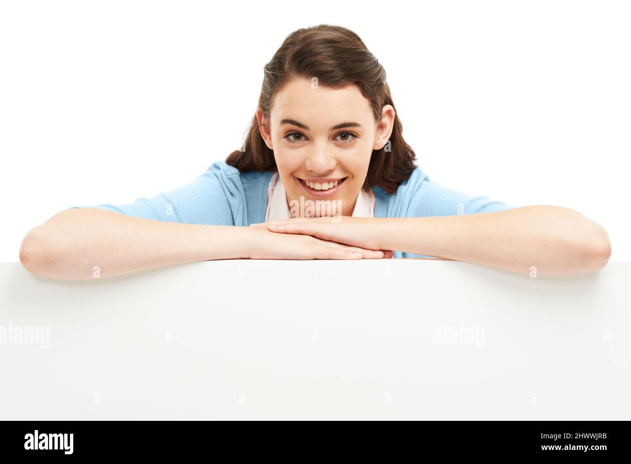 Let her positivity boost your brand. Smiling young woman leaning over a ...