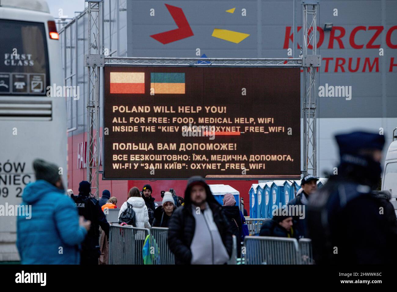 A big electronic billboard is seen with message to support the refugees ...