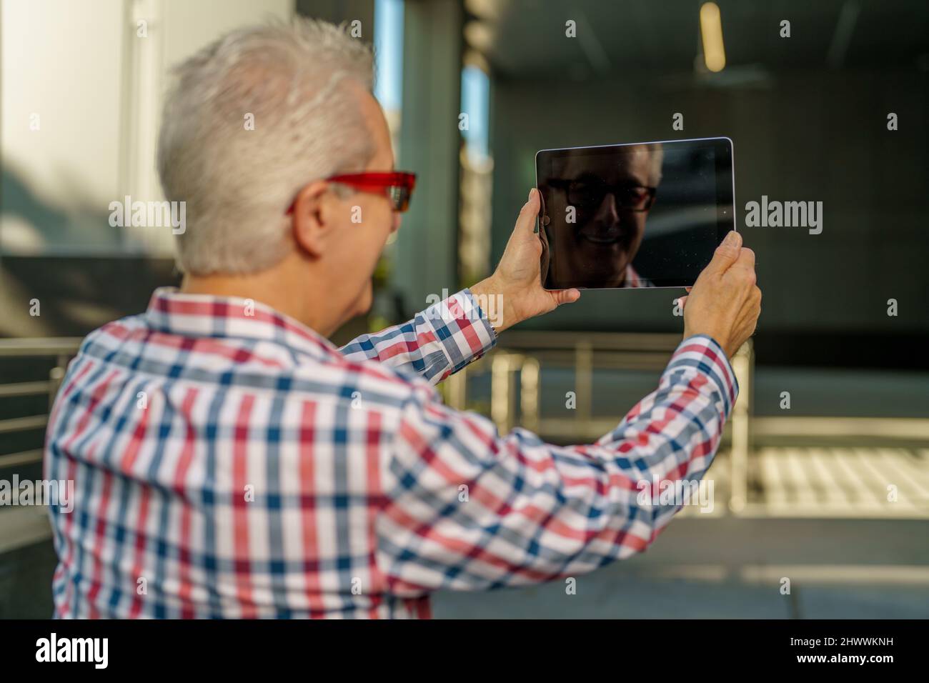 Mans reflection in a black digital tablet screen Stock Photo - Alamy