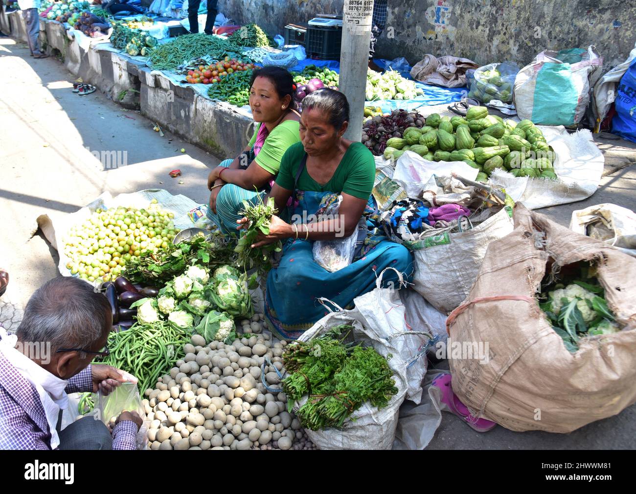 Guwahati, Guwahati, India. 7th Mar, 2022. Bodo tribal women sells green ...