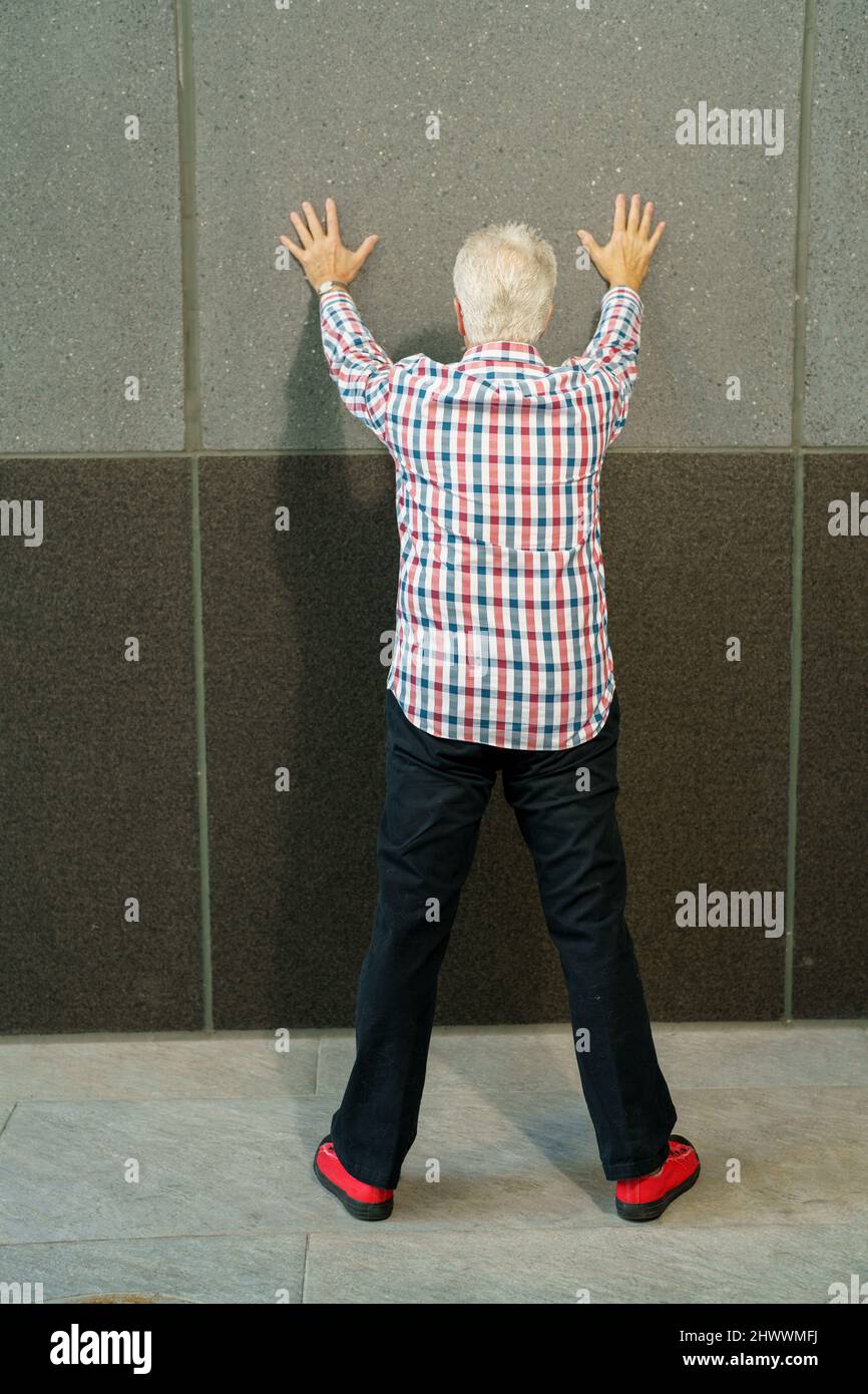 Hands on the wall hi-res stock photography and images - Alamy