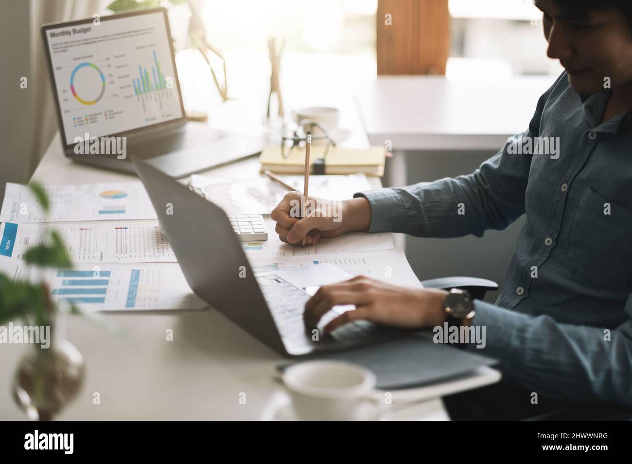 Businessman or bookkeeper working in finance and accounting analyze ...