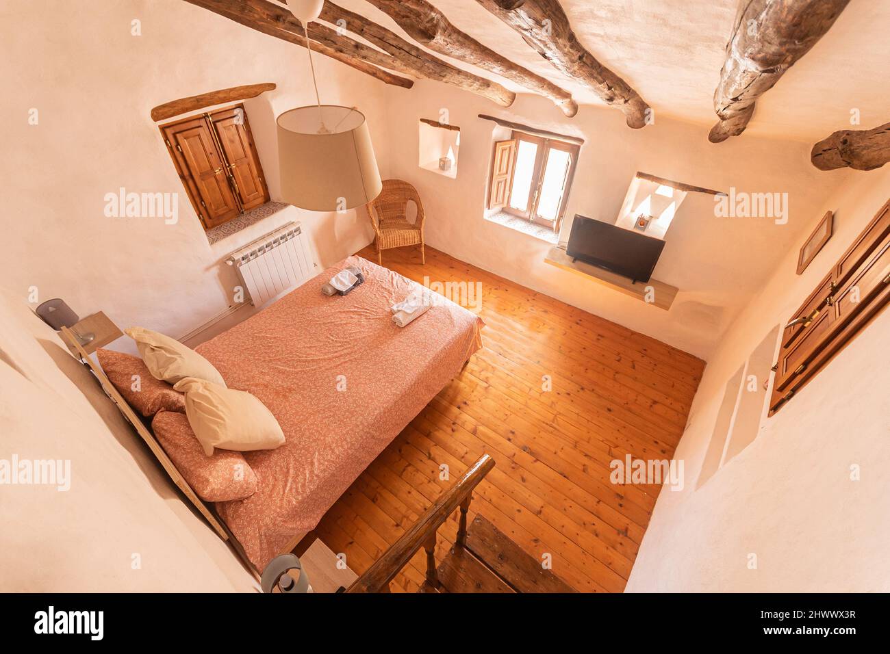 View from above of cozy bedroom of a rural hotel Stock Photo - Alamy