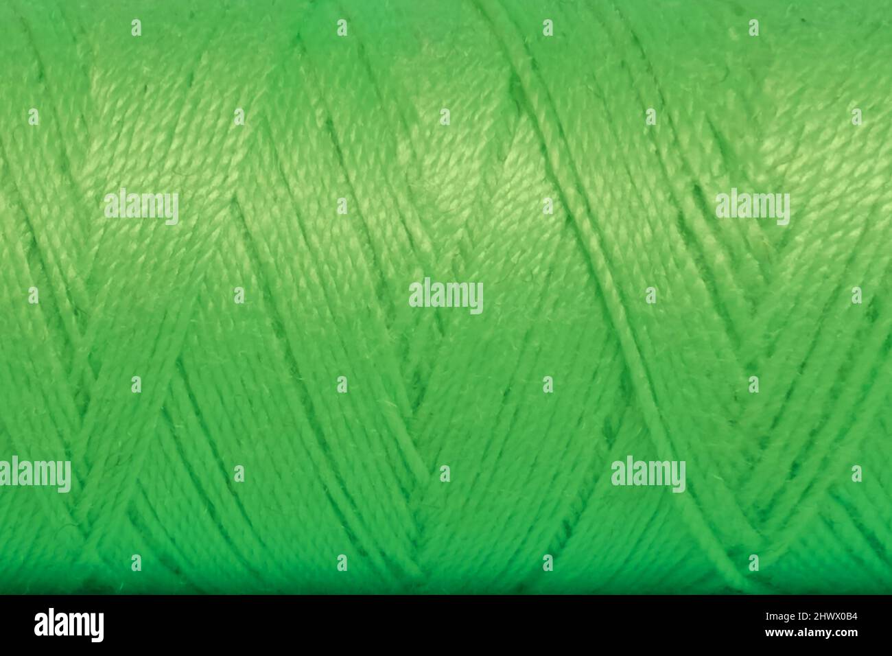 Coils with green threads. Close-up, texture, macro Stock Photo - Alamy