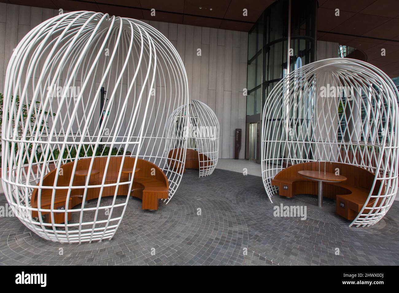 Mu;tiple seating area design at Oasis Garden at CapitaSpring, Singapore ...